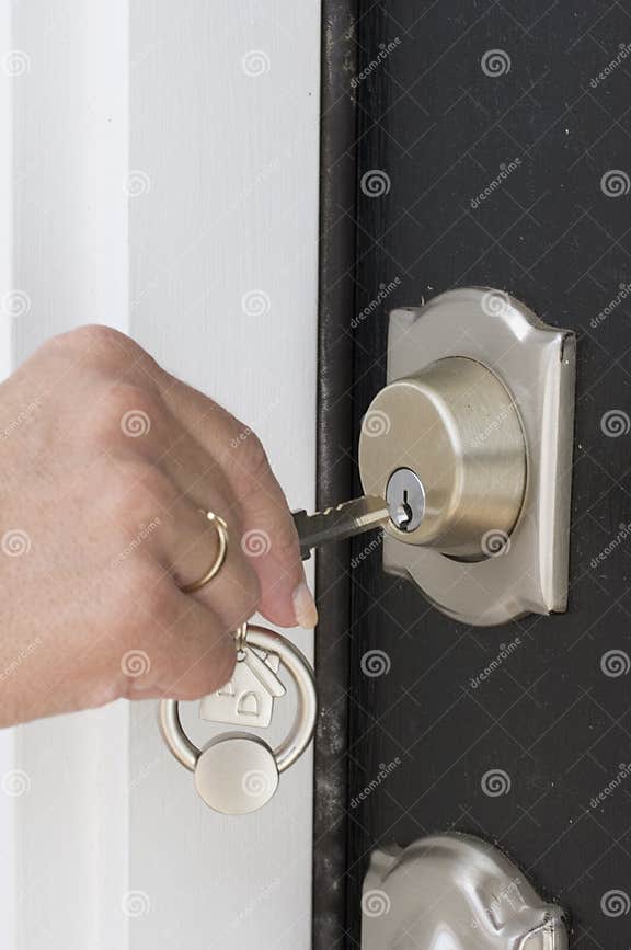 Unlocking the door stock photo. Image of residential, enter - 2080528