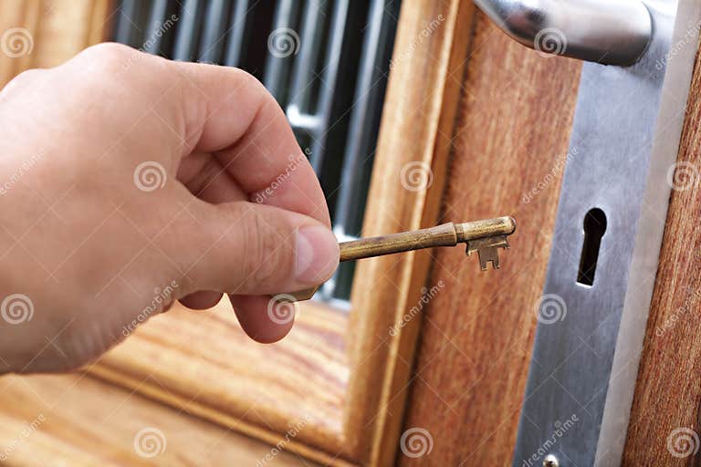 Unlocking a Door with a House Key Stock Photo - Image of unlocking ...