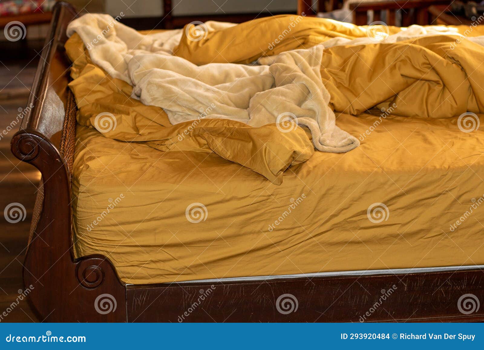 Unmade Bed with Crumpled Sheets Stock Photo - Image of gold, scene ...