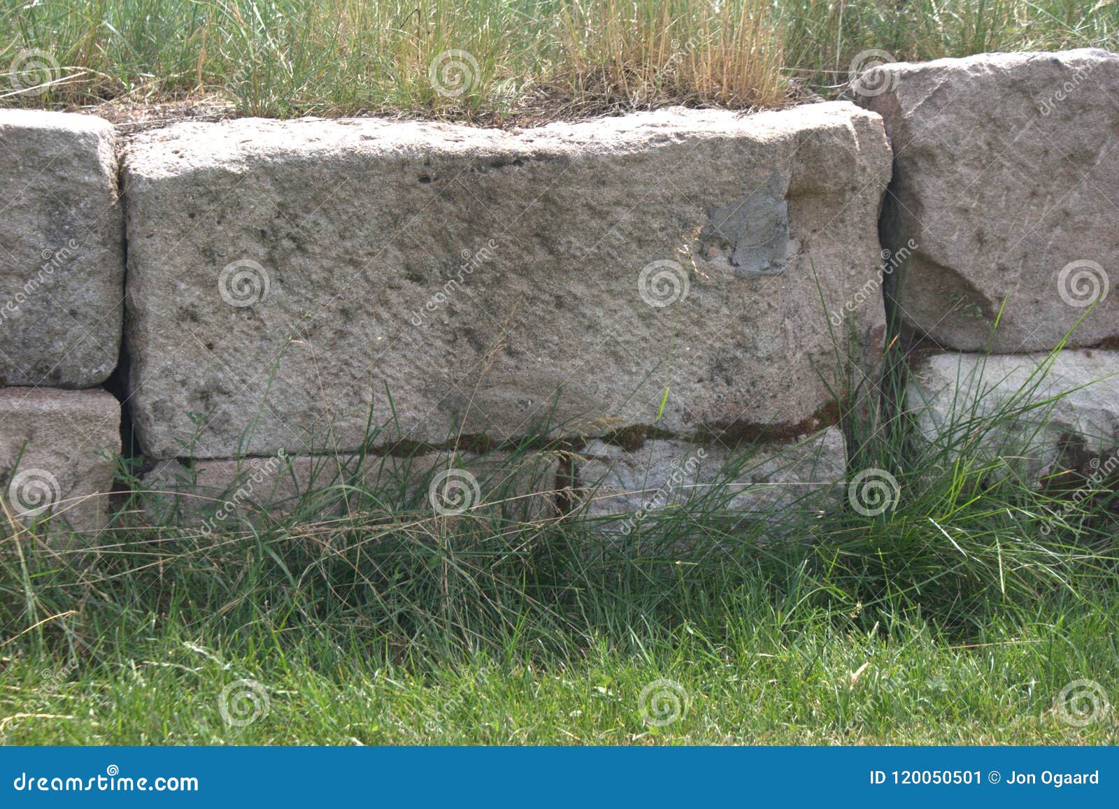 Rough-hewn Drystone Blocks Used in a Retaining Wall with Moss Growing ...