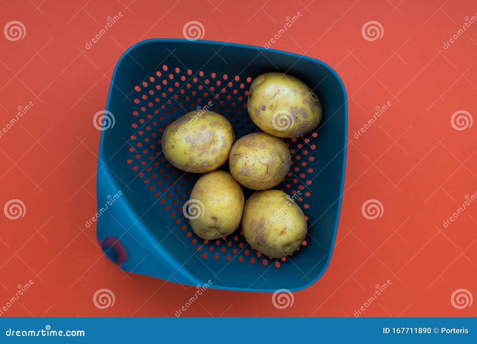 Unpeeled Potatoes in a Colander Stock Photo - Image of closeup, flat ...