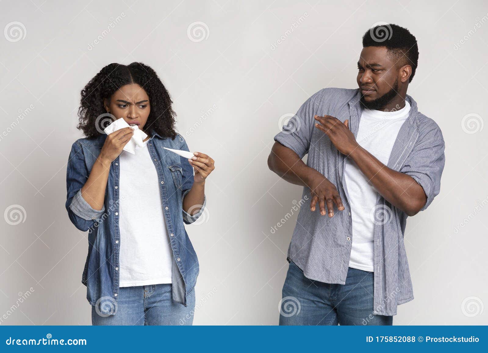 Unpleased Black Man Avoid His Ill Girlfriend with Thermometer in Hands ...
