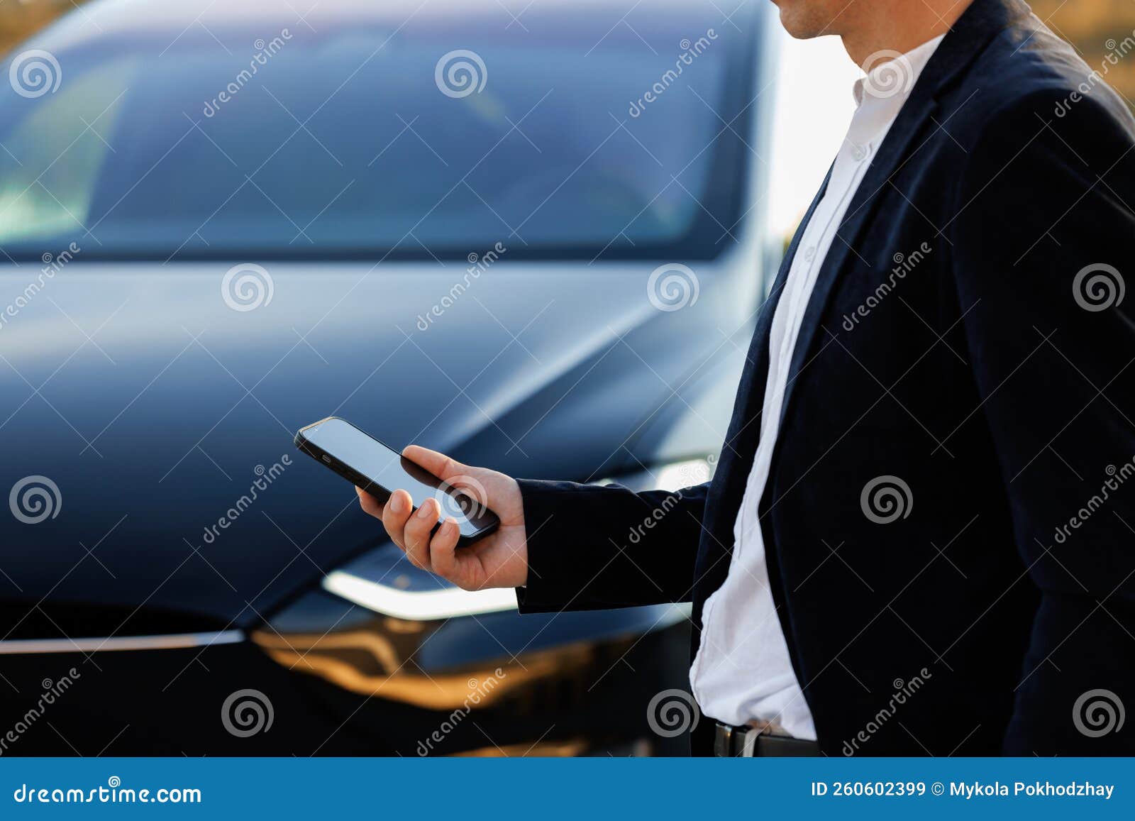 Unrecognizable Businessman Using Smartphone App for Remote Controlling ...