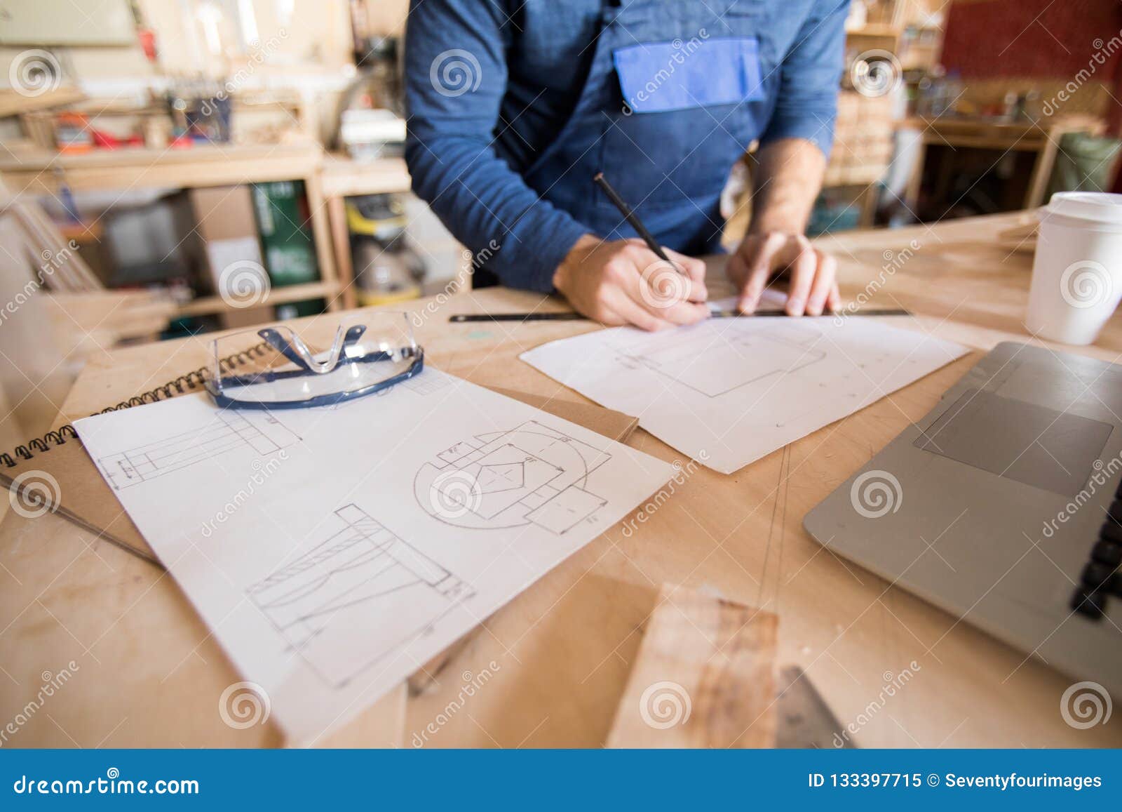 Unrecognizable Carpenter Drawing Plans Stock Image - Image of blueprint ...