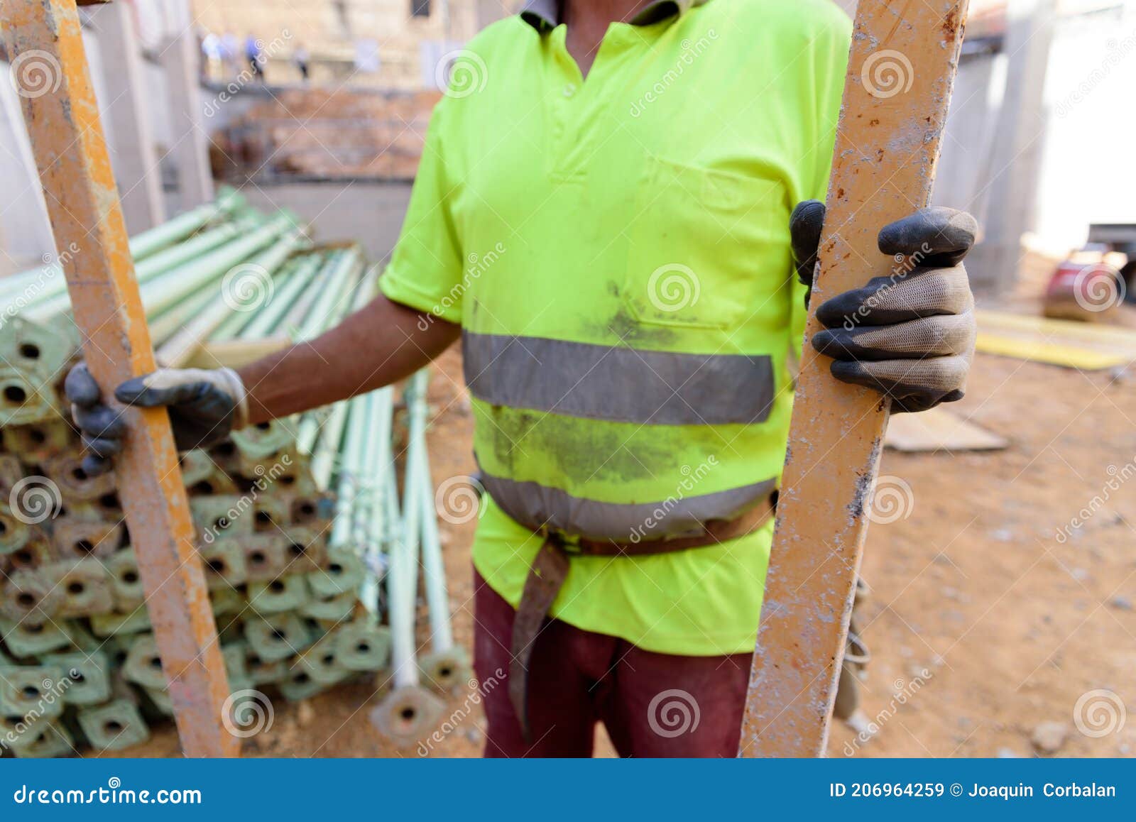 Unrecognizable Construction Worker Working on a Construction Site with ...