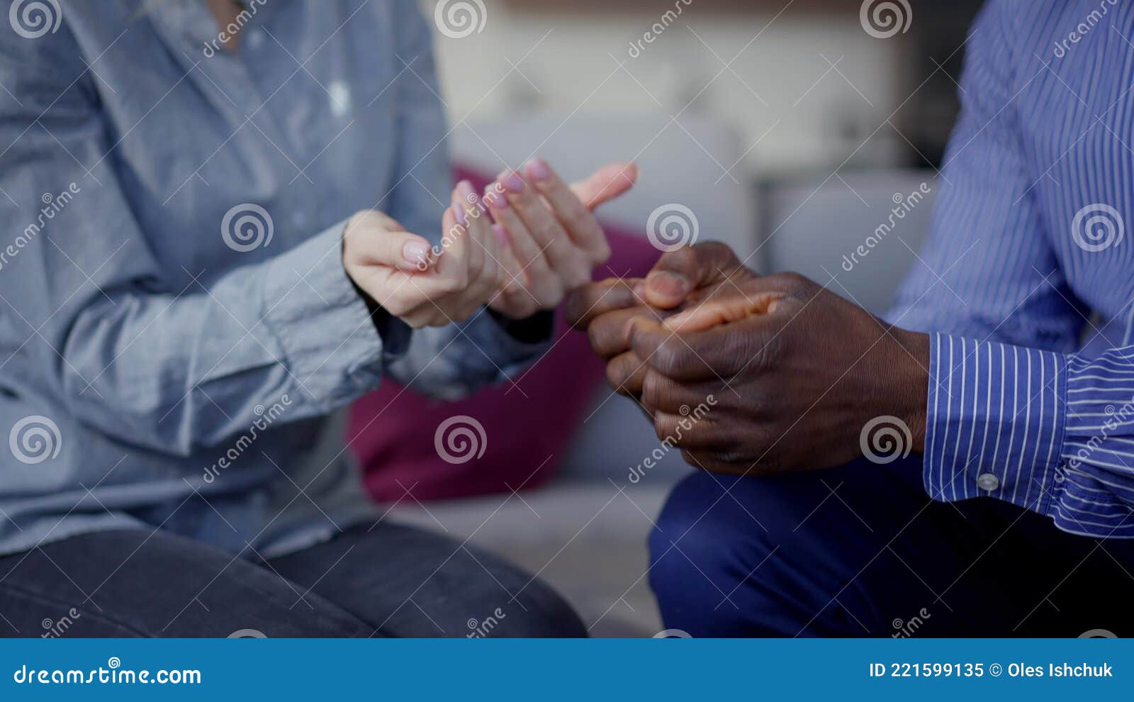 Unrecognizable Interracial Couple Arguing Gesturing Sitting On