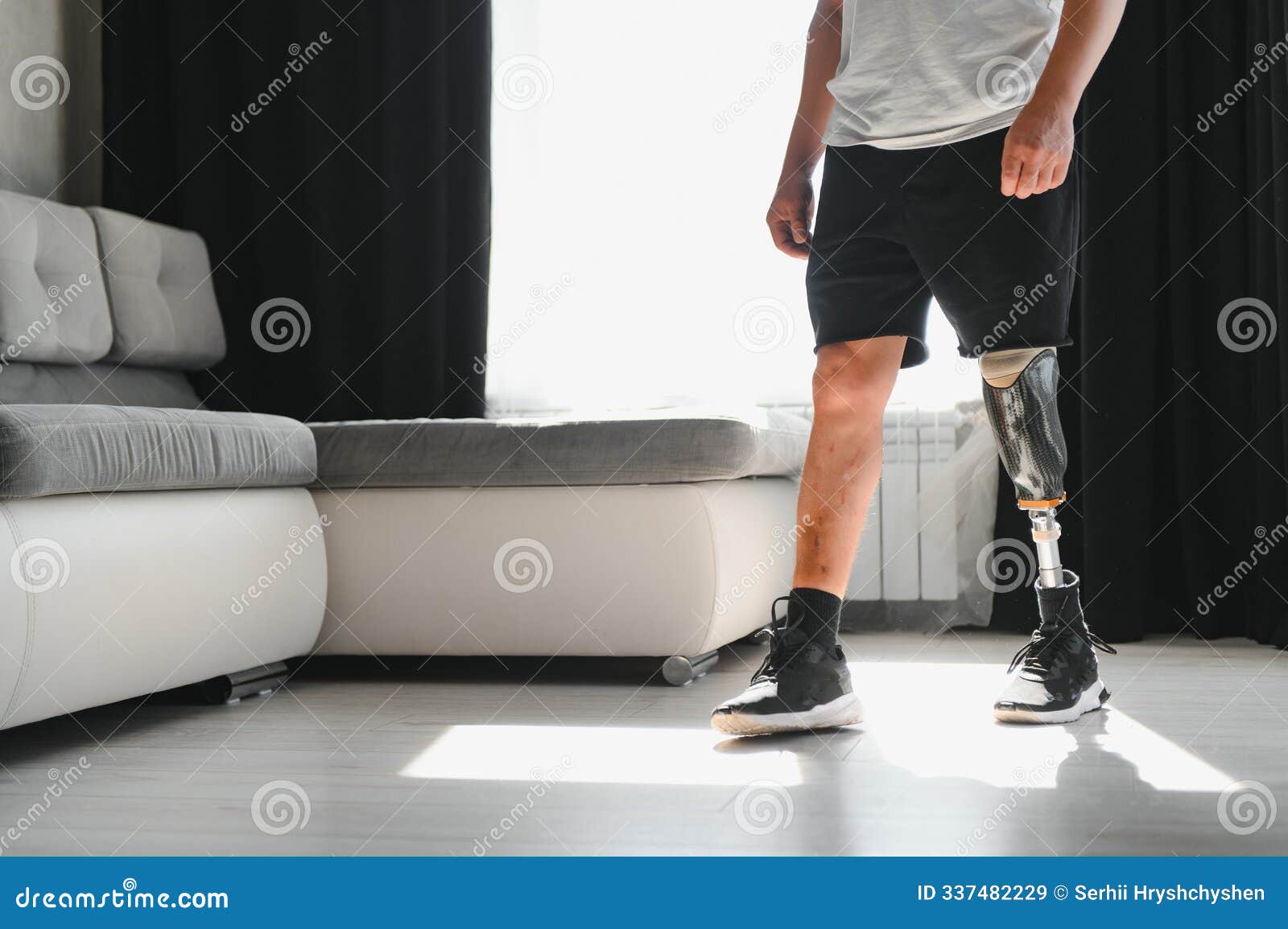 Unrecognizable Man with Bionic Prosthetic Leg at Home Indoors, Copy ...