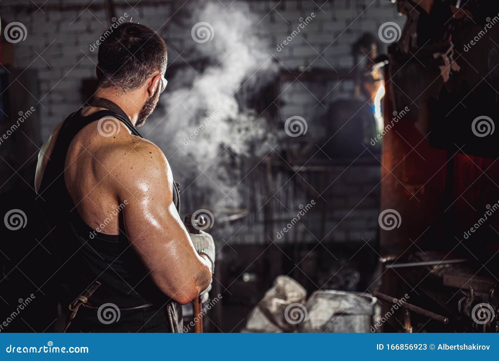 Unrecognizable Muscular Blacksmith in Workshop Stock Image - Image of ...