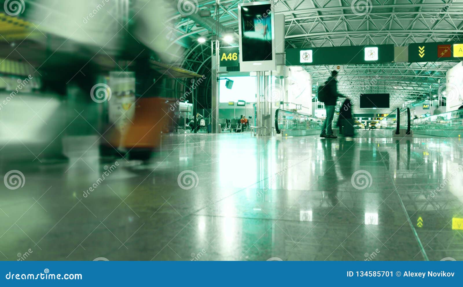 Unrecognizable Passengers Walk in Generic Airport Terminal. Long ...