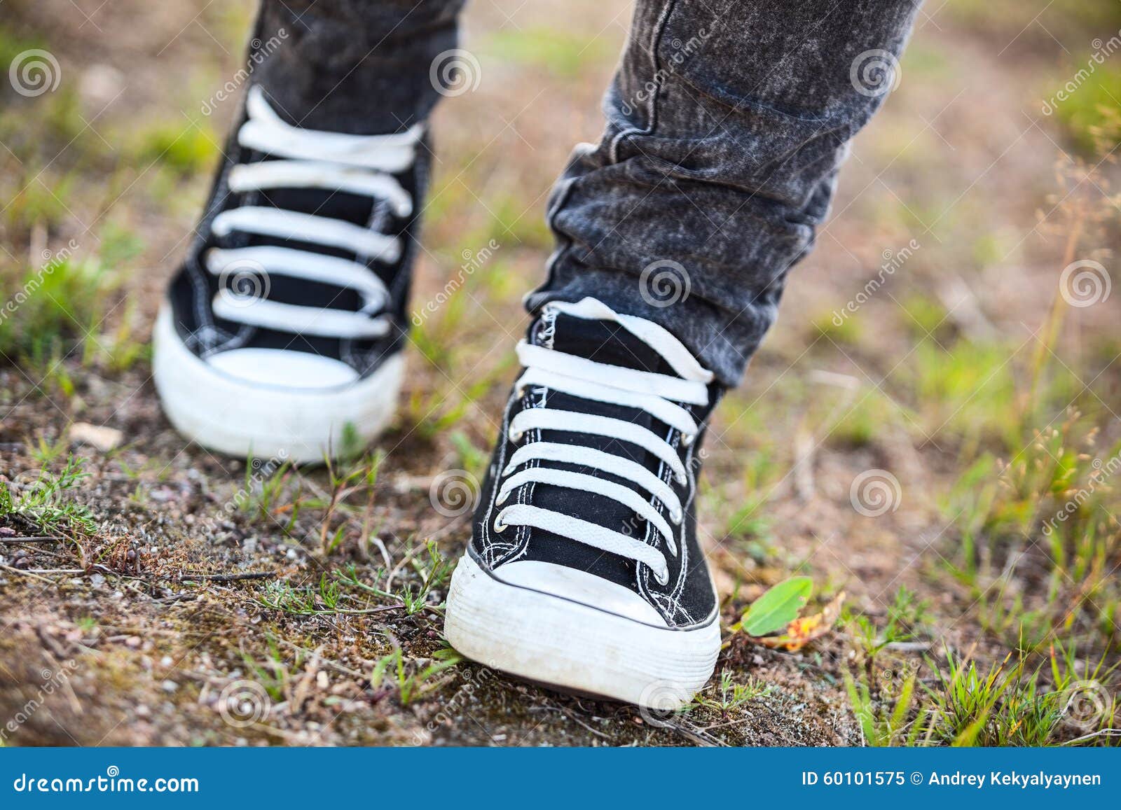 Unrecognizable Person in Rubber Shoes Walks on Footpath, Front View ...