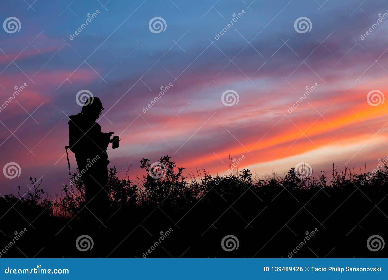 Unrecognized People Using a Celular Smartphone in a Mountain Landscape ...