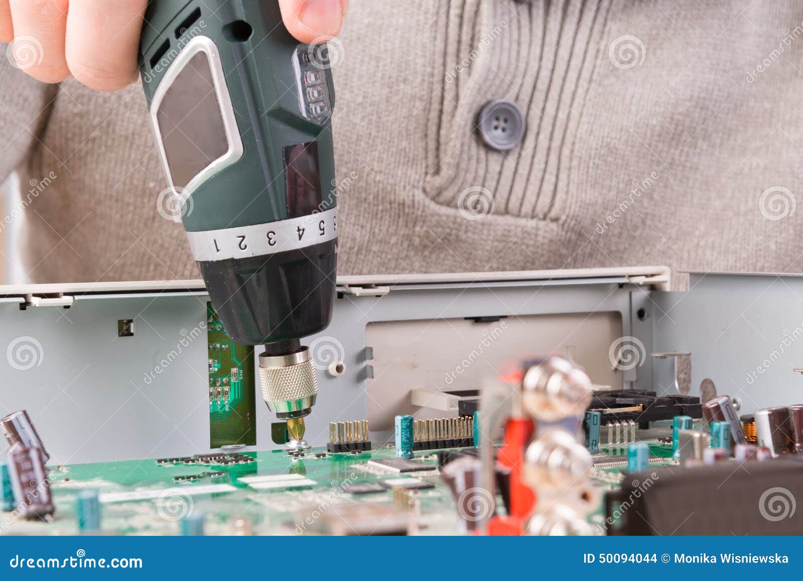 Unscrewing bolt on PCB stock photo. Image of impedance - 50094044