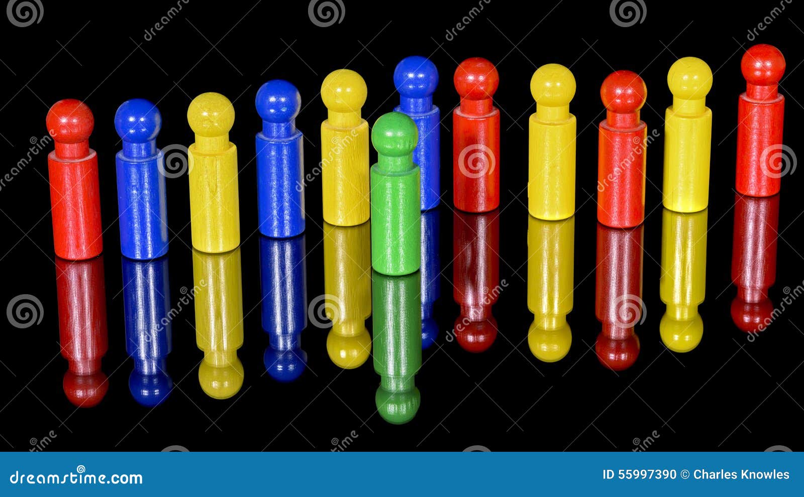 Unsegregated Colored Pegs in a Line Stock Photo - Image of reflection ...