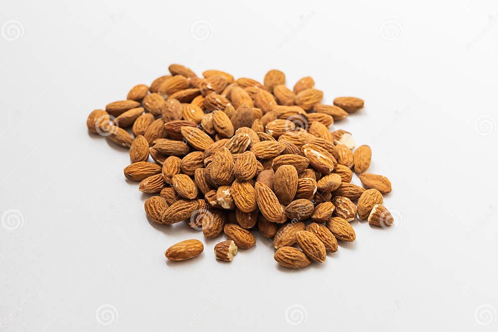 Unshelled Almonds Spread on a Uniform Surface Stock Image - Image of ...