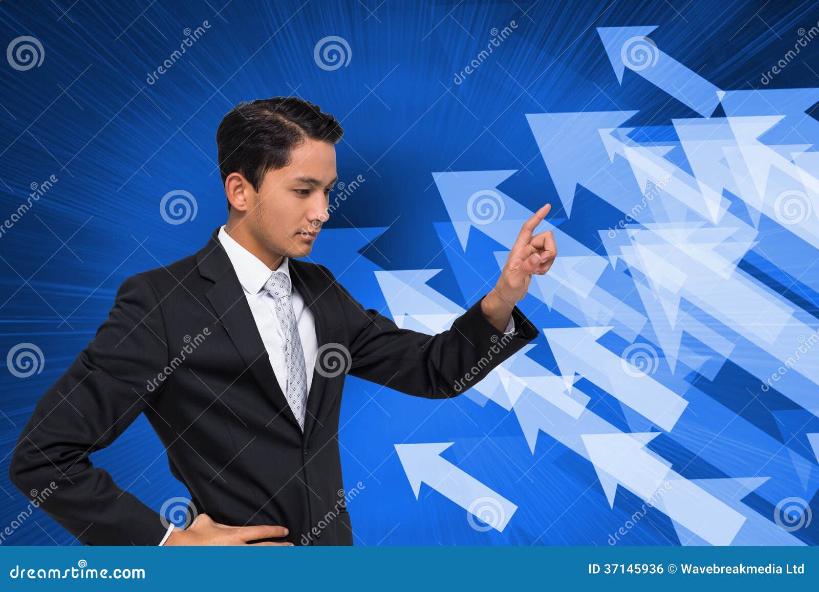 Unsmiling Asian Businessman Pointing Stock Photo - Image of technology ...