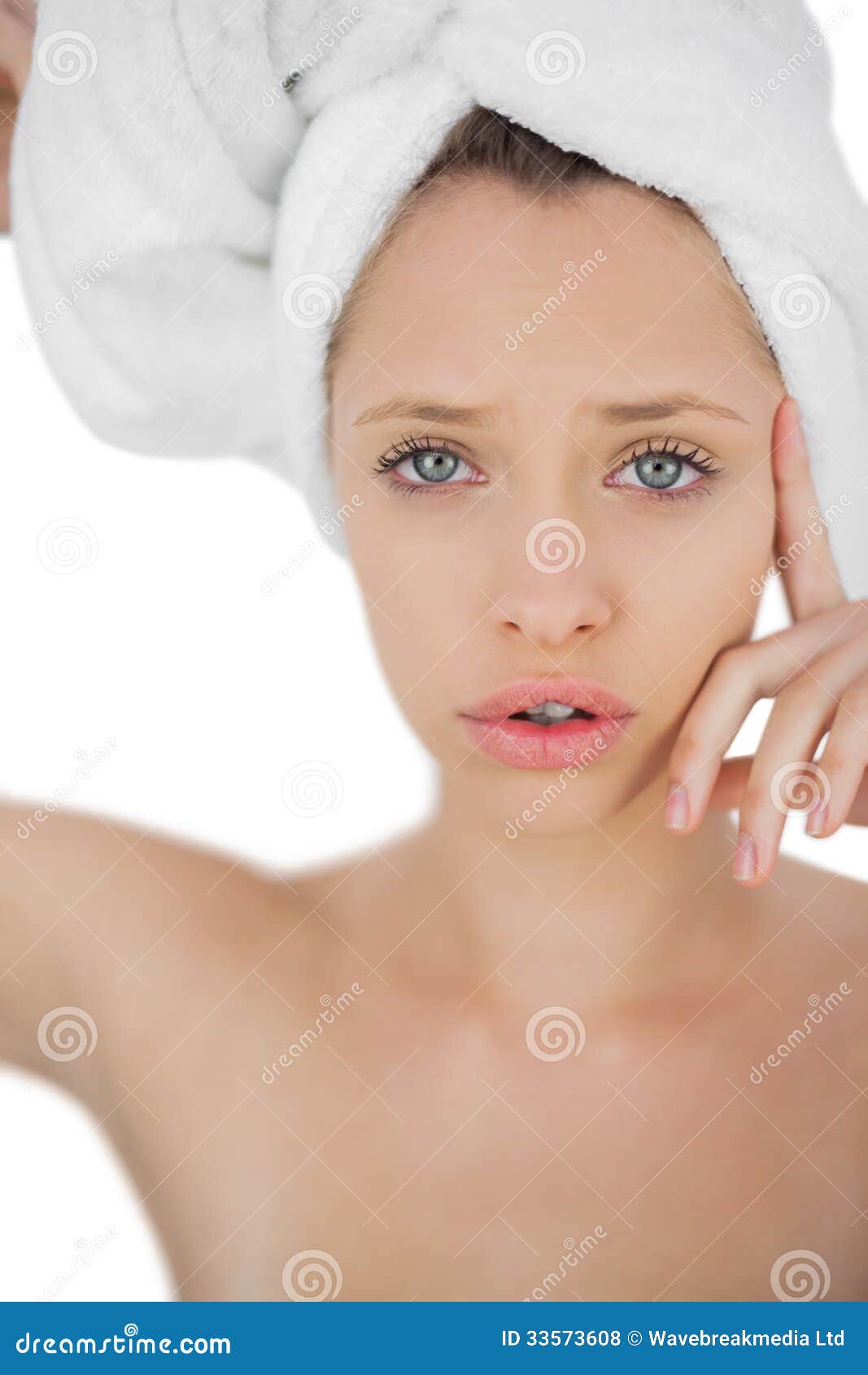 Unsmiling Brunette Drying Her Hair Looking at Camera Stock Photo ...