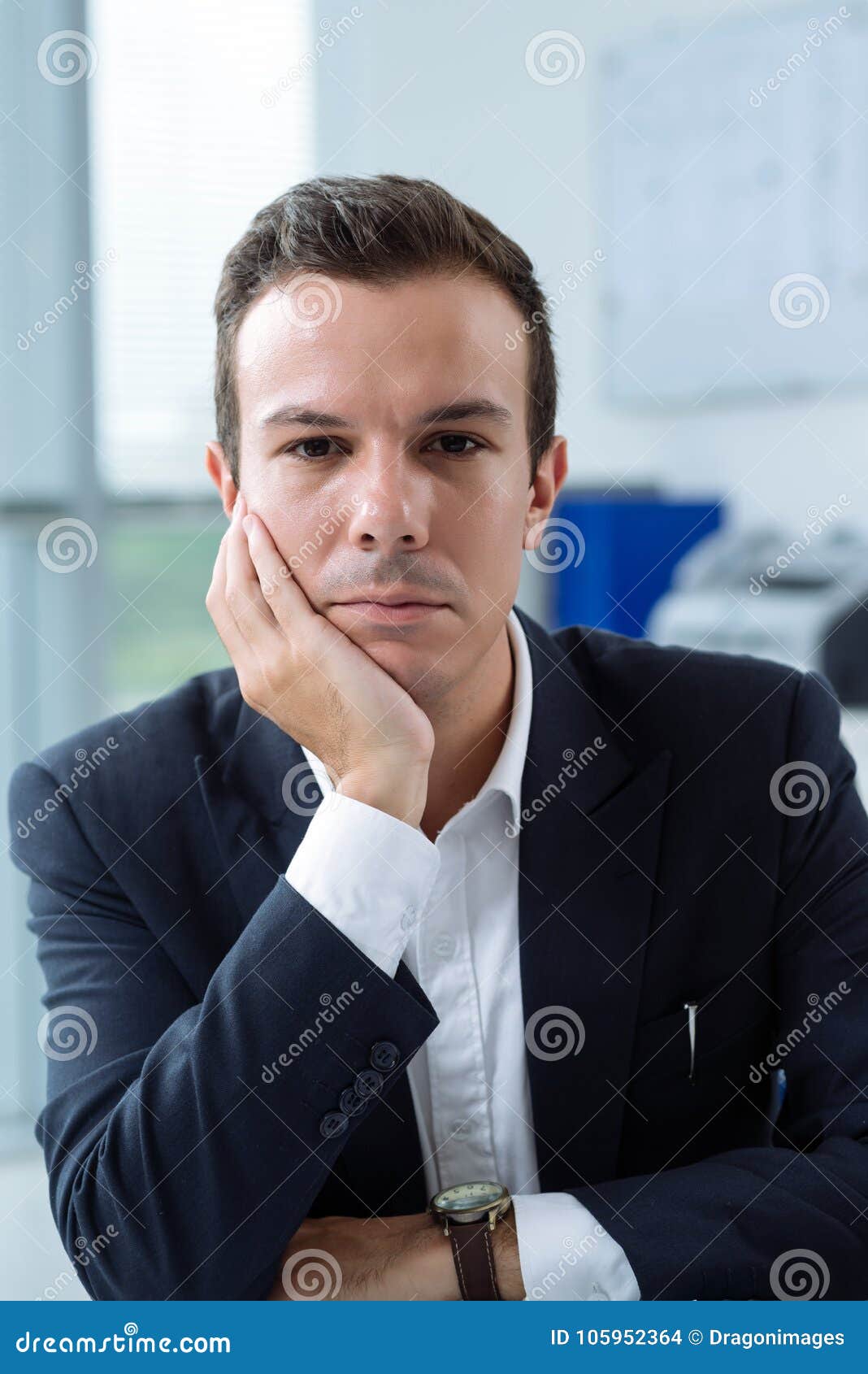 Unsmiling businessman stock photo. Image of attractive - 105952364