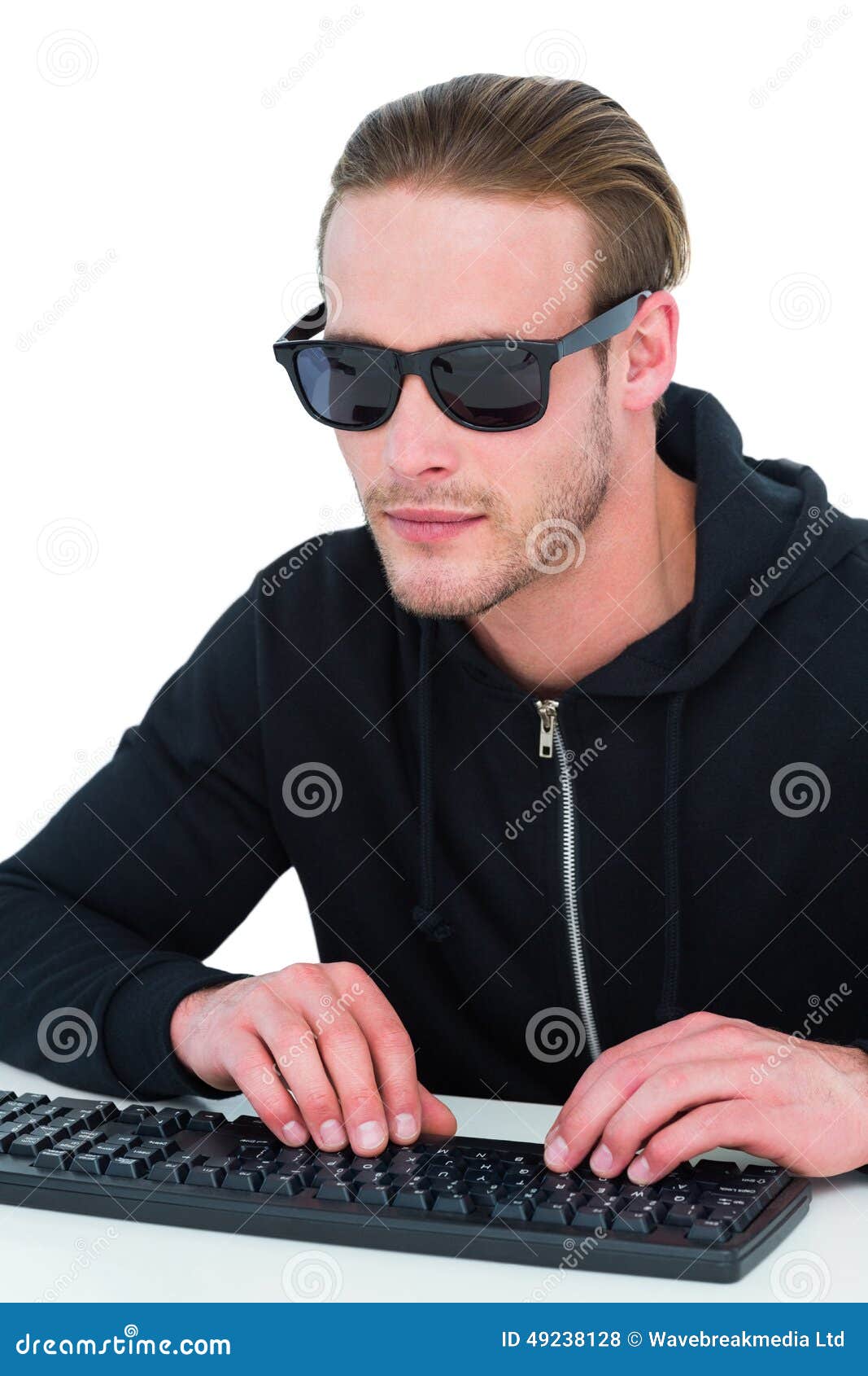Unsmiling Hacker Typing on Keyboard Stock Photo - Image of identity ...