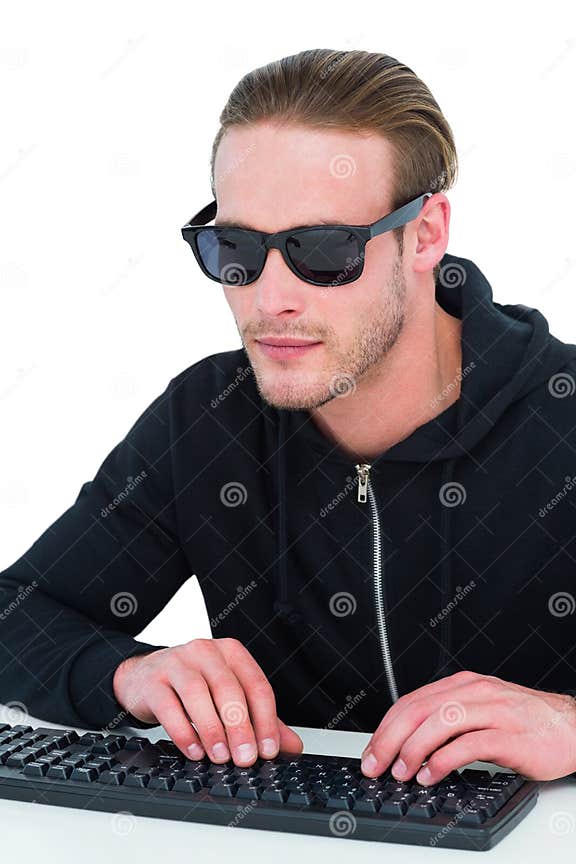 Unsmiling Hacker Typing on Keyboard Stock Photo - Image of identity ...