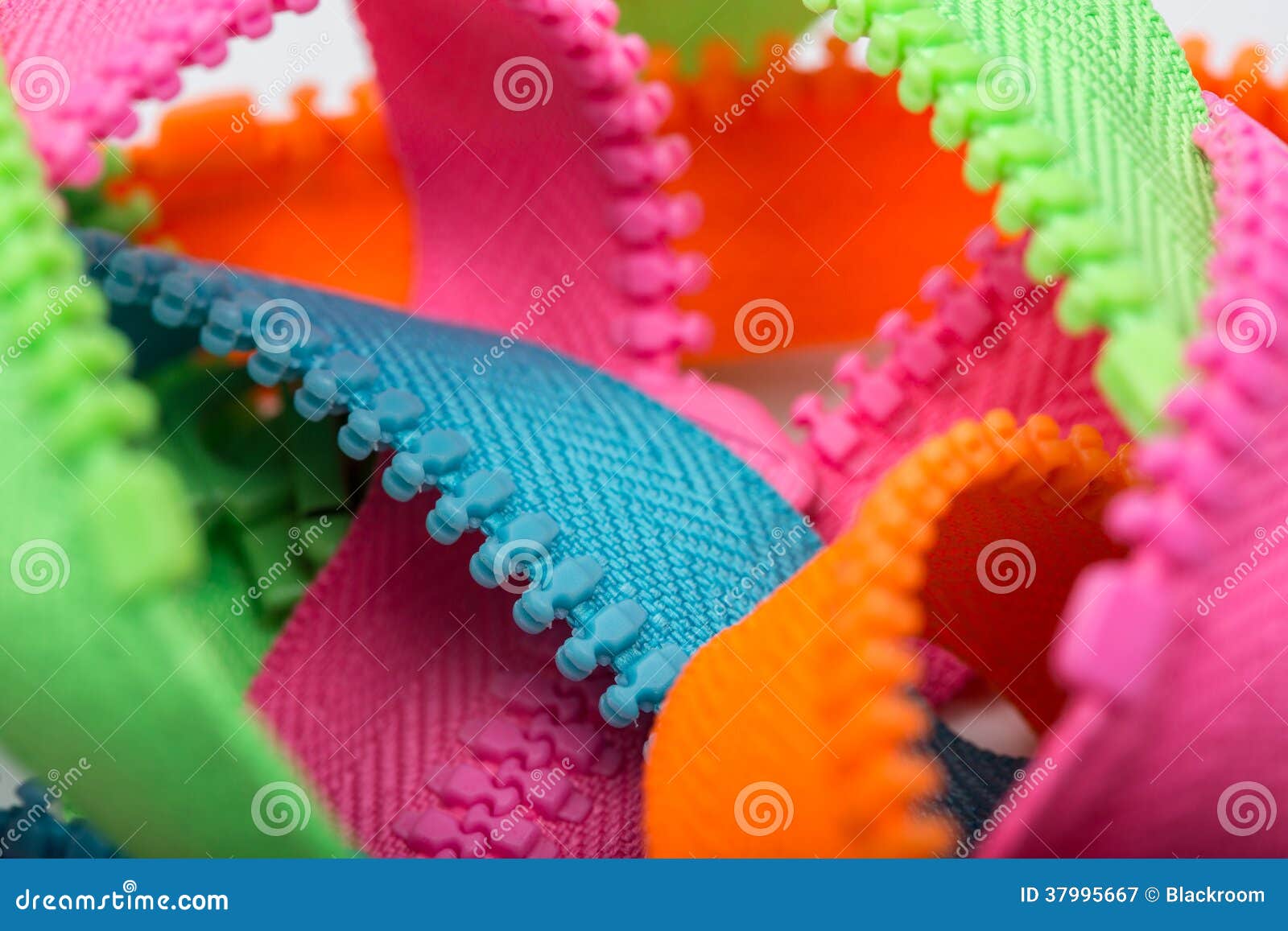Unsorted colorful zippers stock image. Image of metal - 37995667