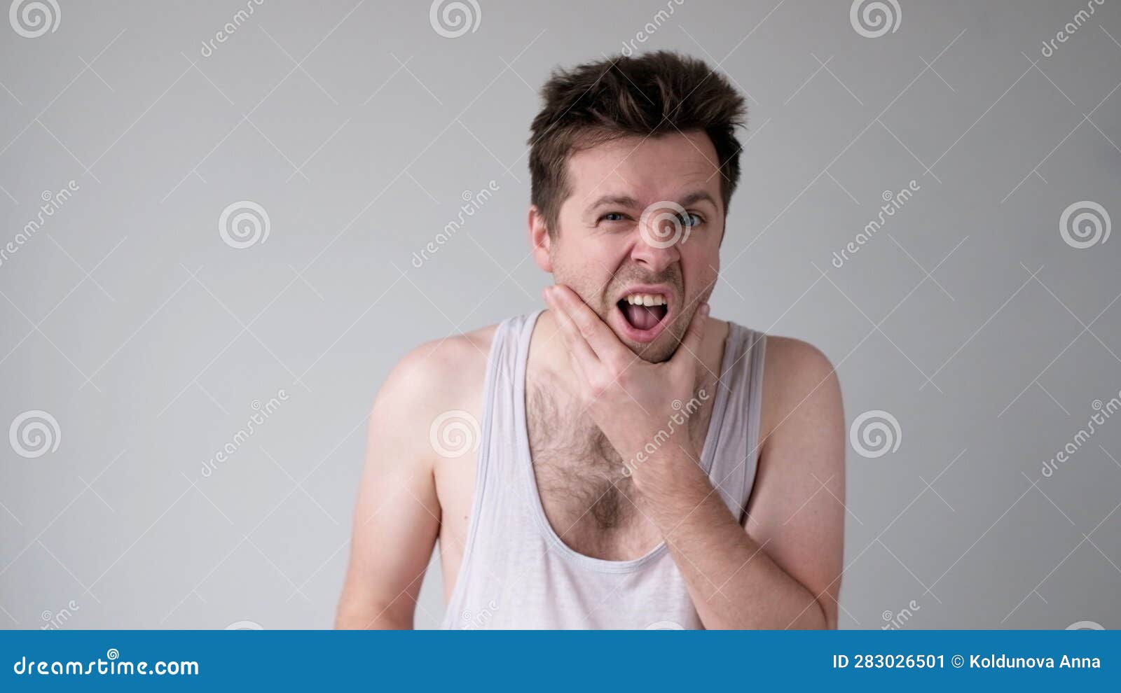 Untidy Caucasian Man in Doubt is Scratching His Chin Stock Image ...