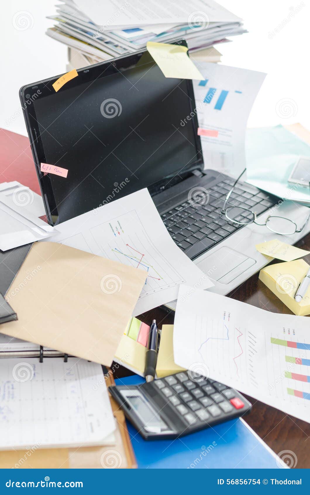 Untidy and cluttered desk stock photo. Image of work - 56856754