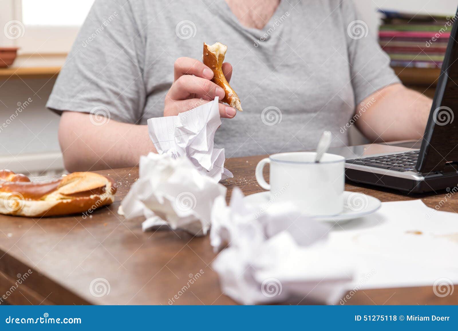Untidy Desk and a Thick Man with Food in His Hands Stock Photo - Image ...
