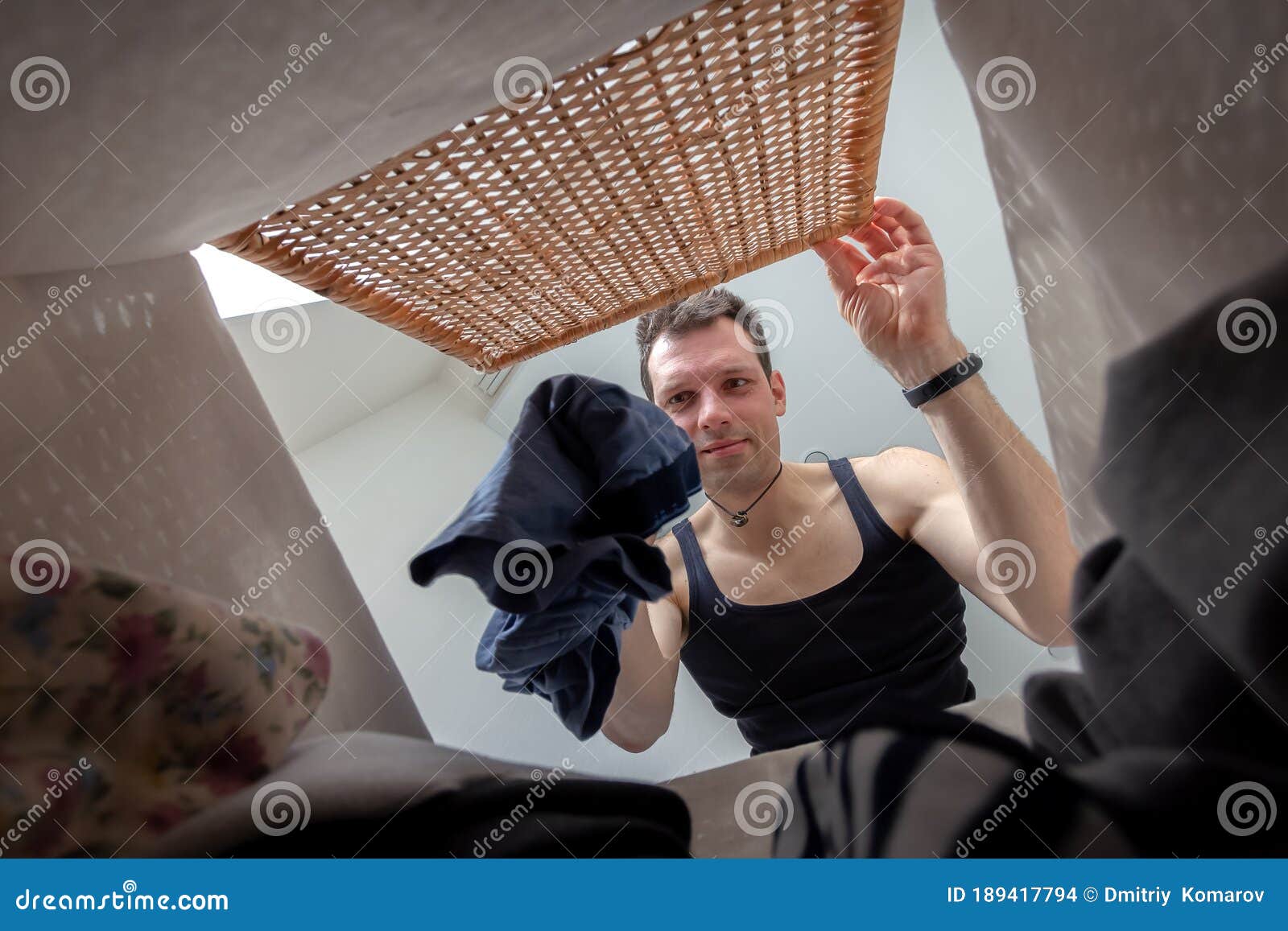 Untidy Man Pulls Out or Throws Dirty Laundry Clothes in Wicker Basket ...