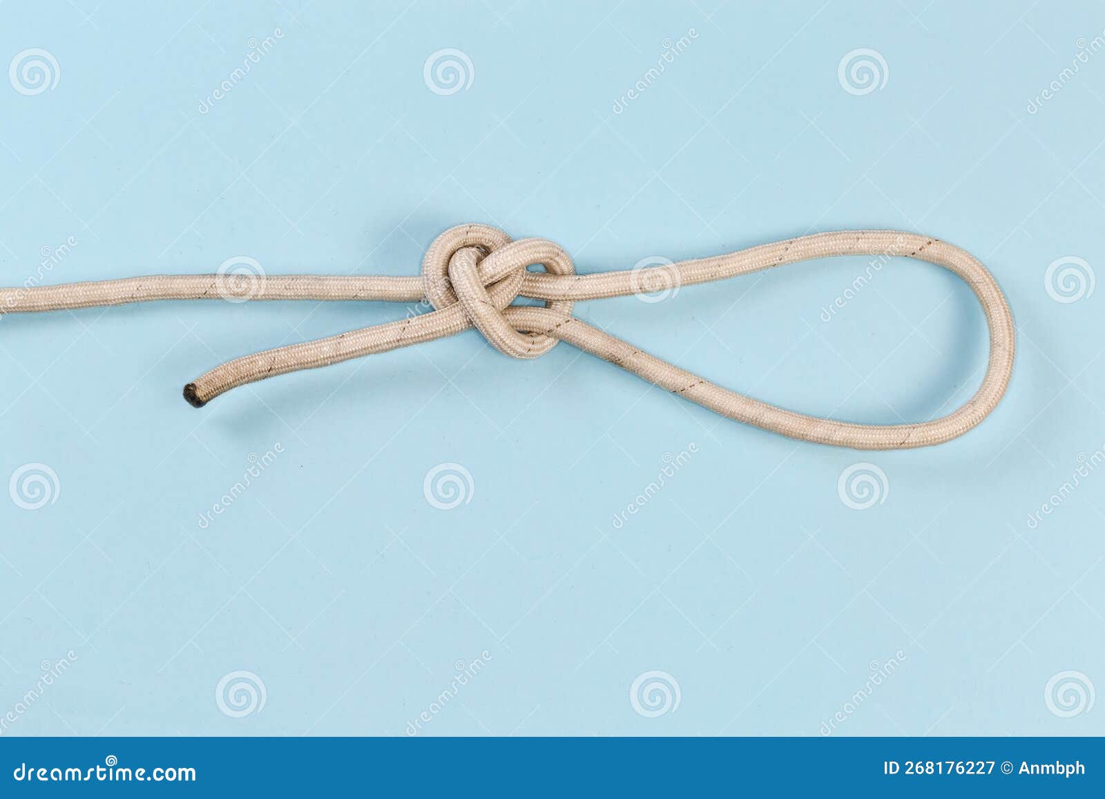 Untightened Rope Angler`s Loop on a Blue Background Stock Image - Image ...