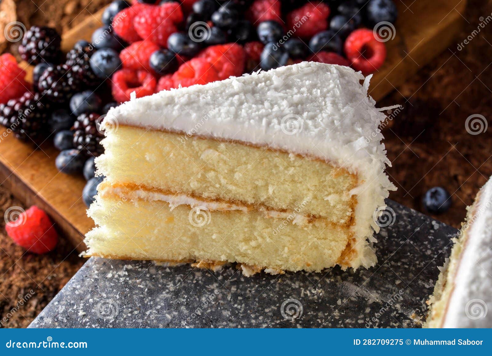 Indulgent Close-Up of White Chocolate Coconut Cake Slice in ...