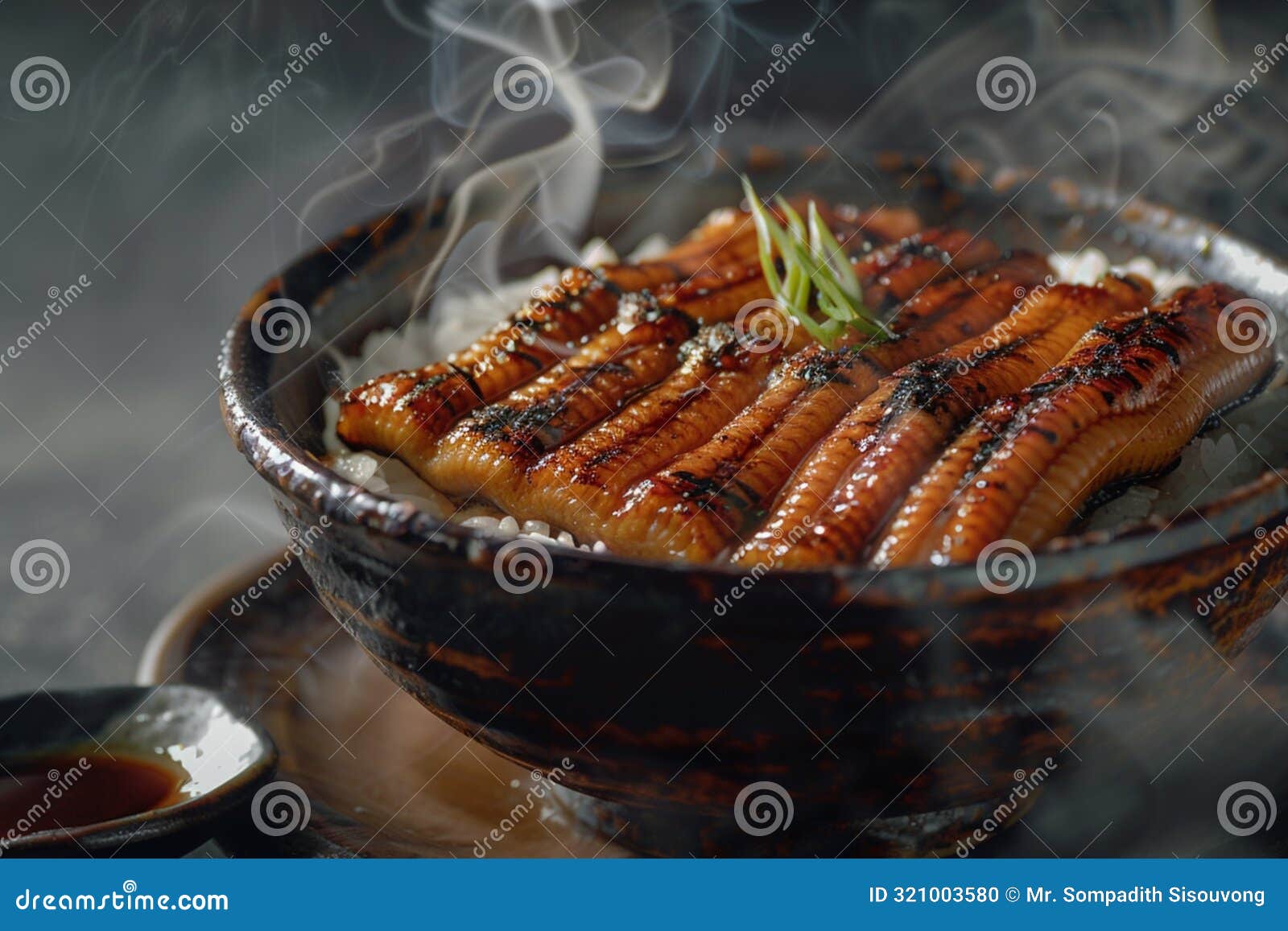 Japanese Unadon Kabayaki, Grilled Eel Over Rice In A Black Bow Royalty ...
