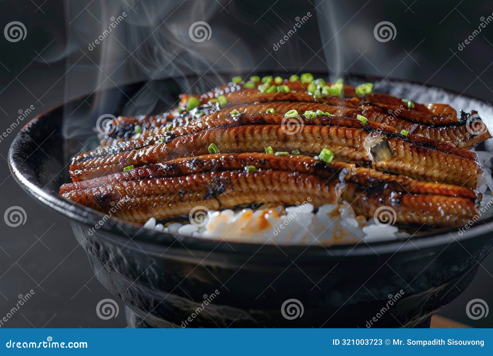Japanese Unadon Kabayaki, Grilled Eel Over Rice in a Black Bow Stock ...