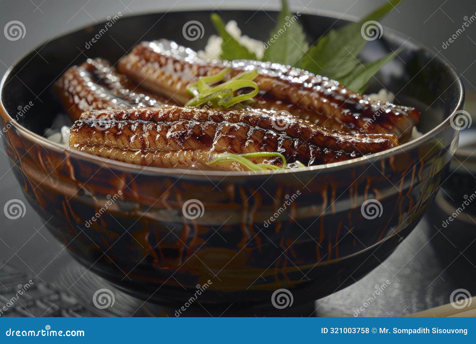 Japanese Unadon Kabayaki, Grilled Eel Over Rice in a Black Bow Stock ...