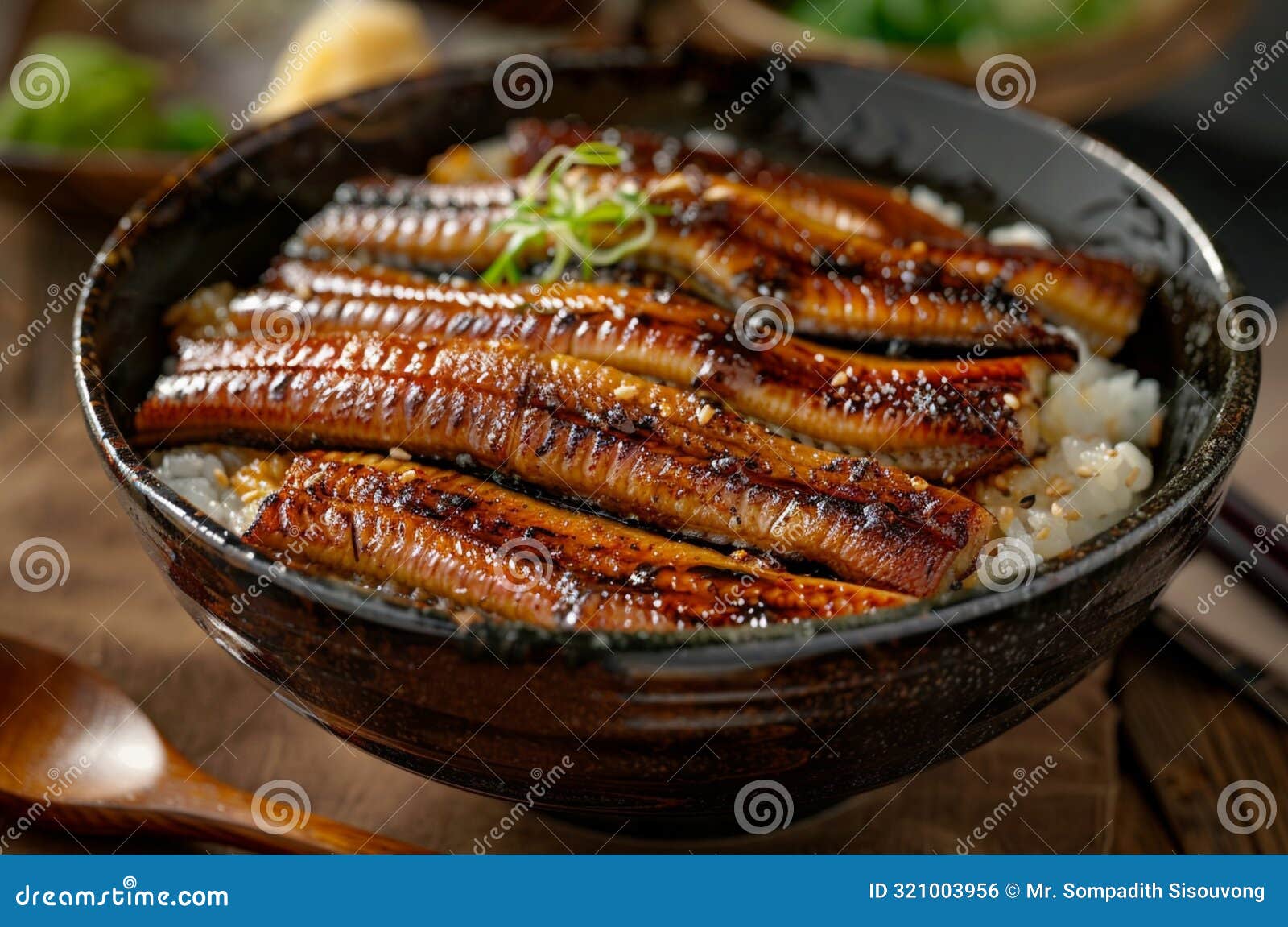 Japanese Unadon Kabayaki, Grilled Eel Over Rice In A Black Bow Stock ...