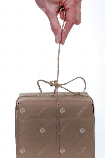 Untying string on package stock image. Image of gift - 24193981