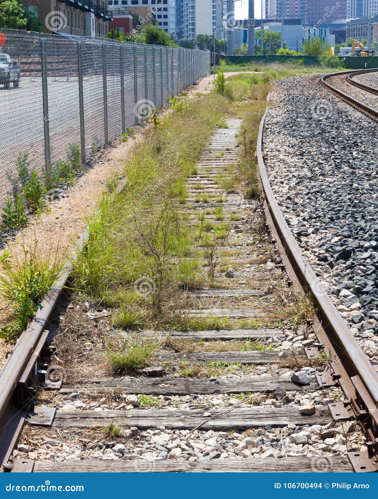 Unused Railroad Track Covered with Weeds and Curving Editorial Stock ...