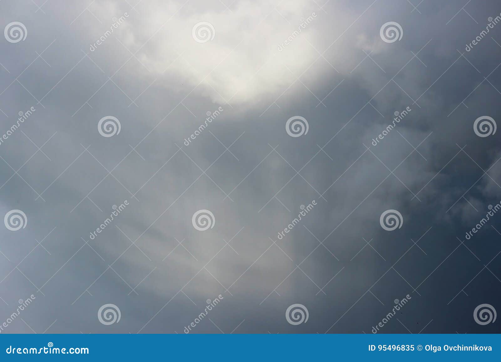 Unusual Glow of Sunlight through Dark Gray Rain Clouds before a ...
