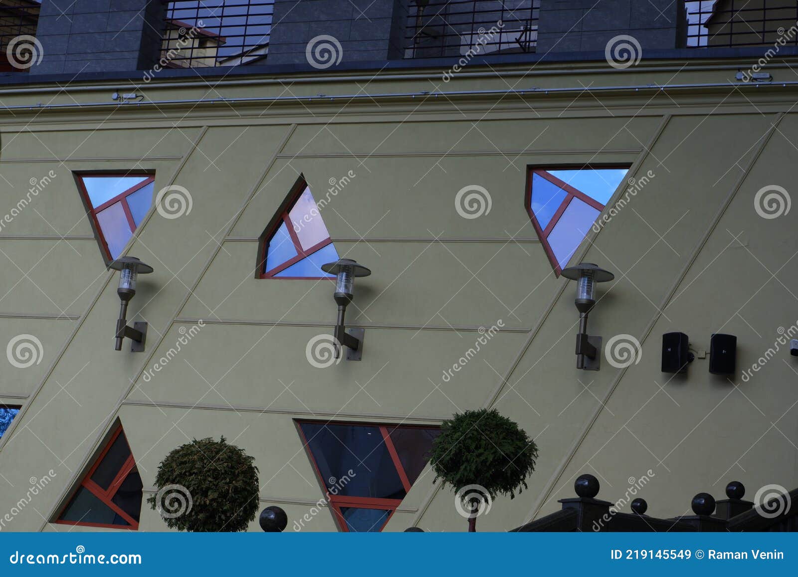 Unusual Irregular Geometric Shapes of the Windows Reflect the Evening ...