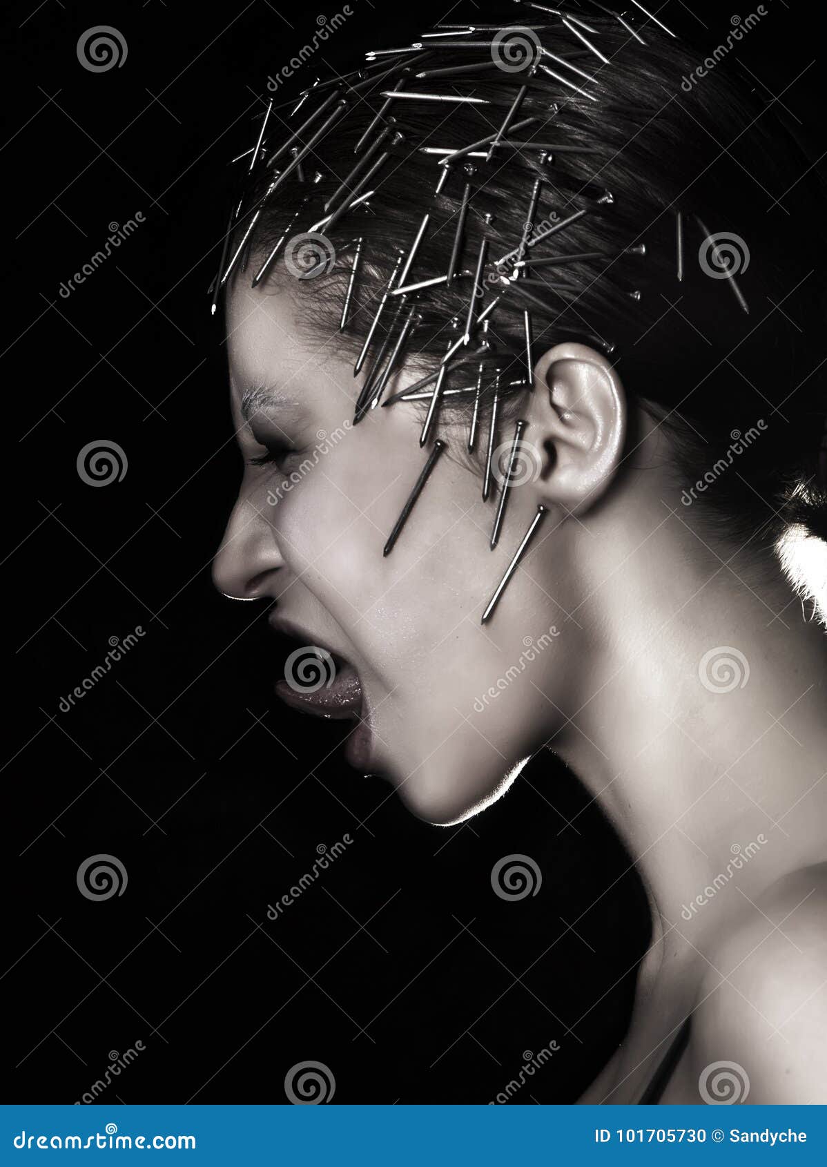 Unusual Makeup of Beautiful Girl with Nails in Her Head Stock Photo ...