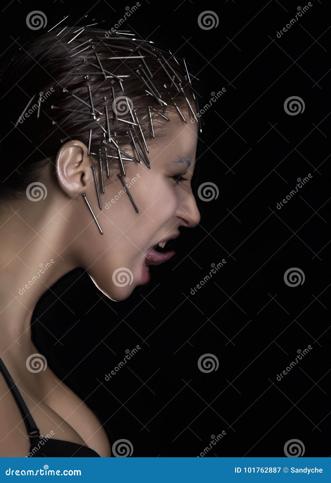 Unusual Makeup of Beautiful Girl with Nails in Her Head Stock Image ...