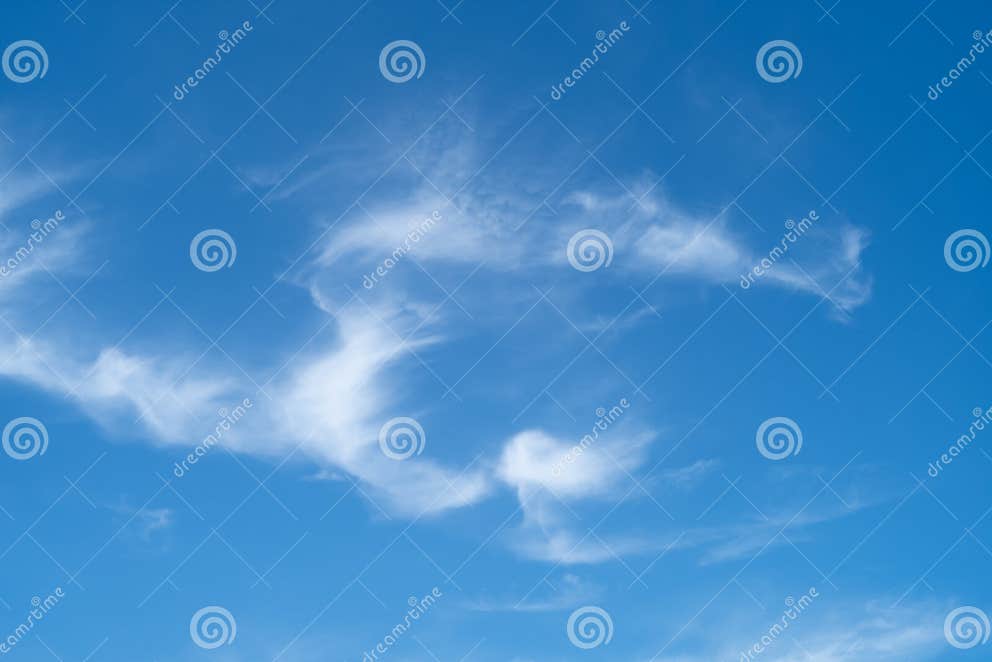Unusual Patterns of Wispy Clouds Against a Blue Sky on a Summer Day ...