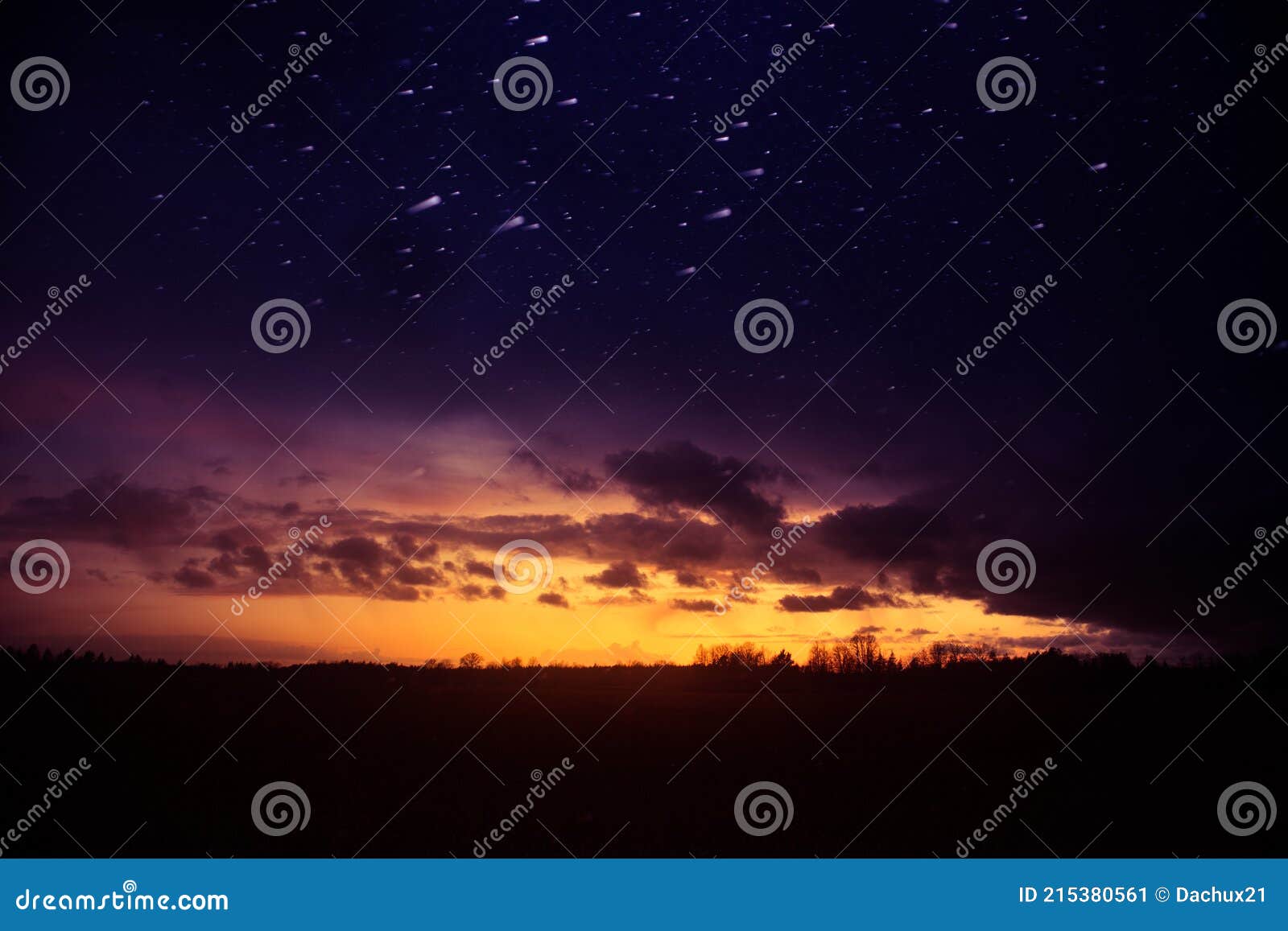 An Unusual Sight of a Snow Storm on the Green Field in Spring during ...