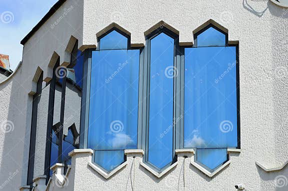 Unusual Window and Reflection in it Stock Image - Image of window, facade: 333528609