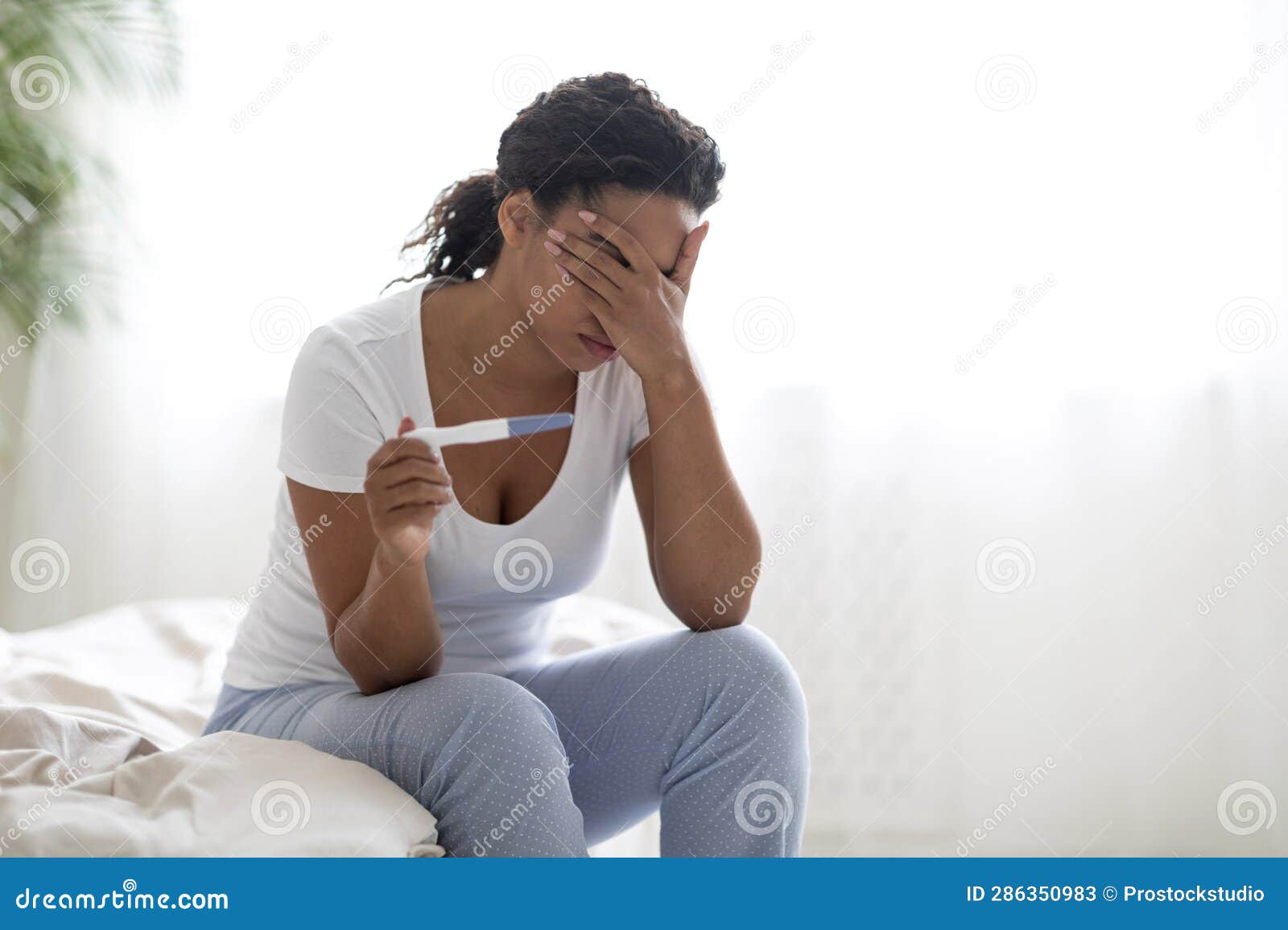 Unwanted Pregnancy Concept Desperate Black Woman Holding Pregnancy