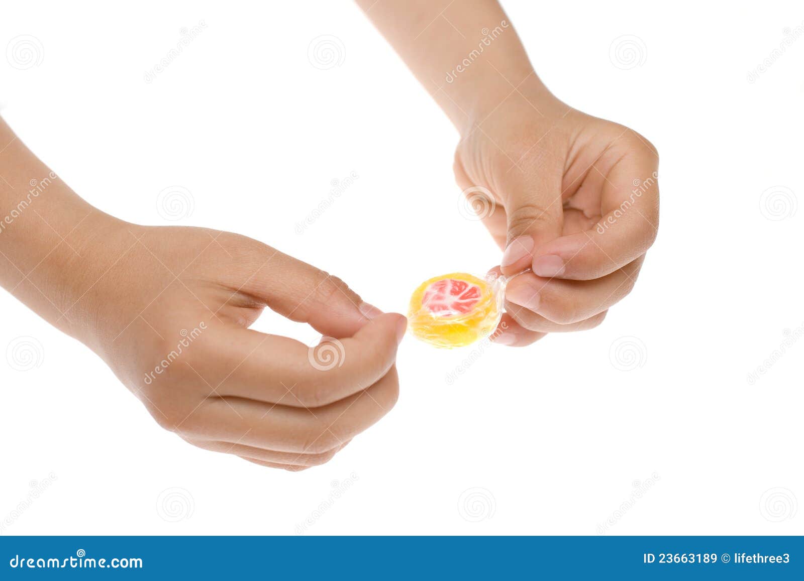 Unwrapping a candy stock image. Image of help, candy - 23663189