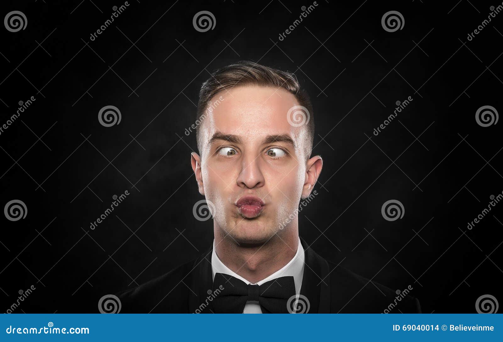 Uomo D'affari Sciocco Con Il Fronte Divertente Fotografia Stock ...