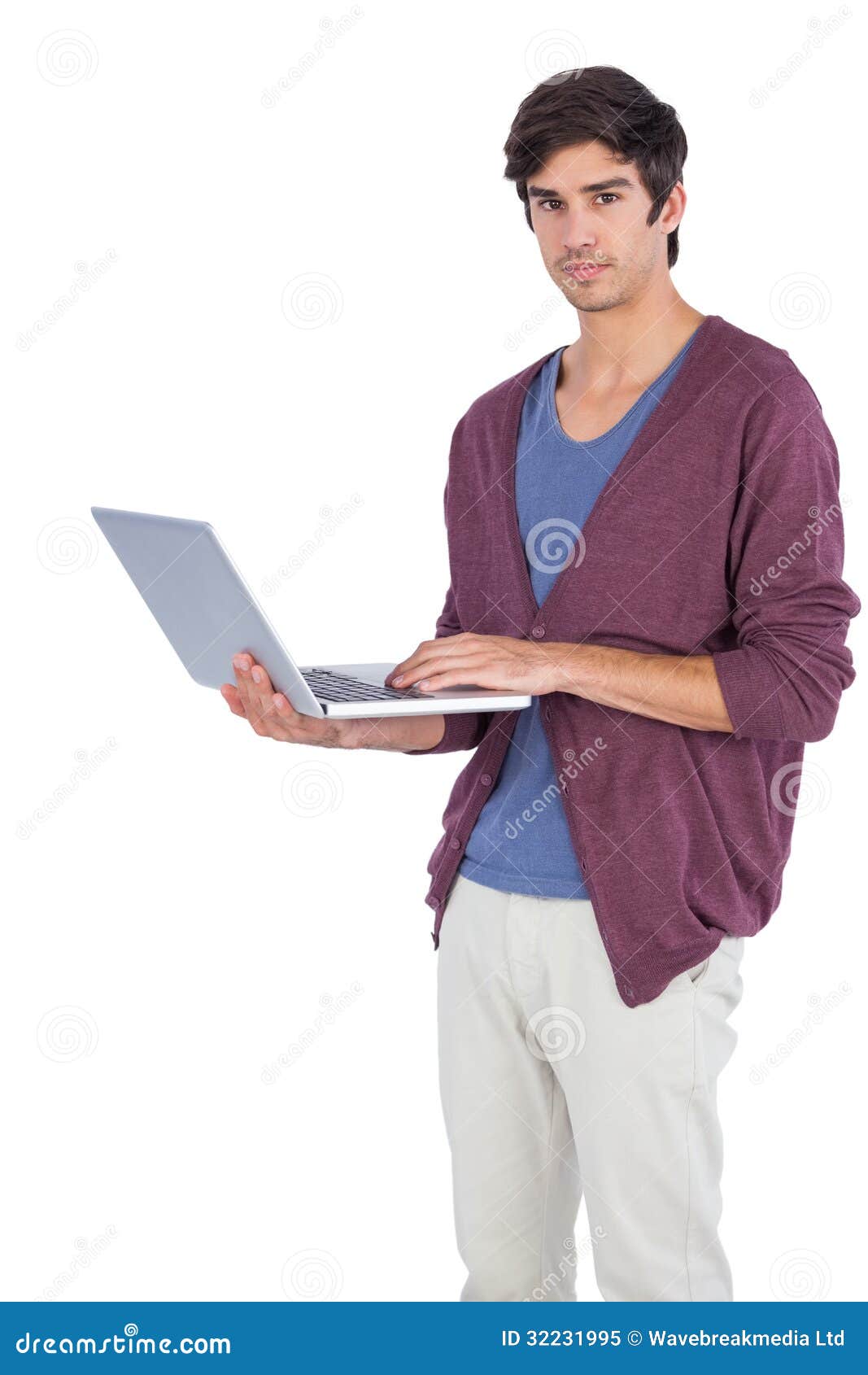 Uomo Serio Che Tiene Un Computer Portatile Immagine Stock - Immagine di ...