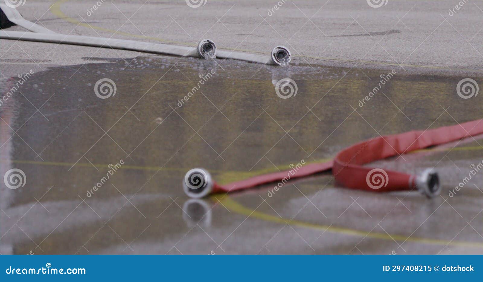 An Up-close Shot Captures a Fire Hose with a Powerful Stream of Water ...
