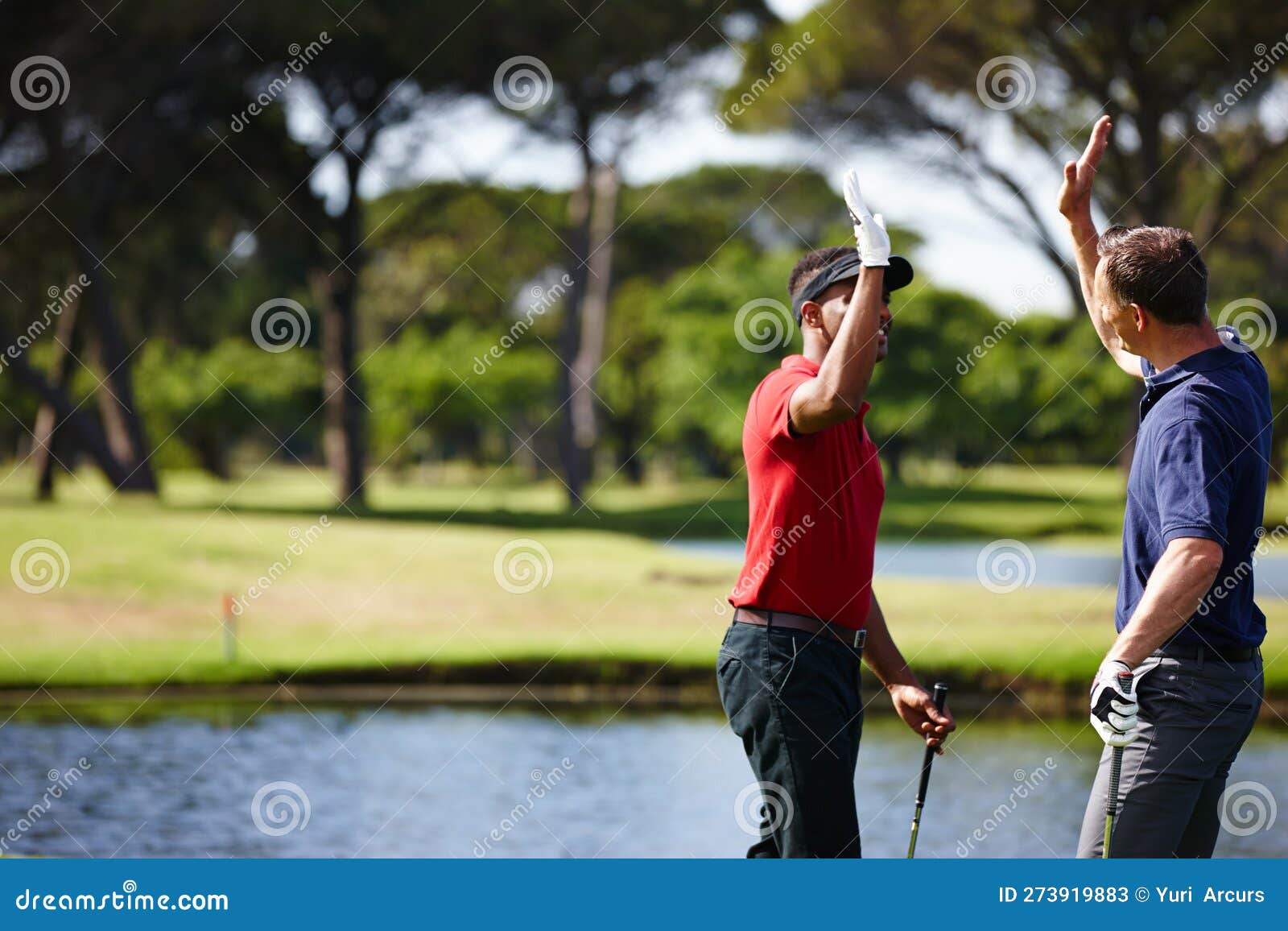 Up Top. Two Golfers Congratulating Each Other with a High Five. Stock ...