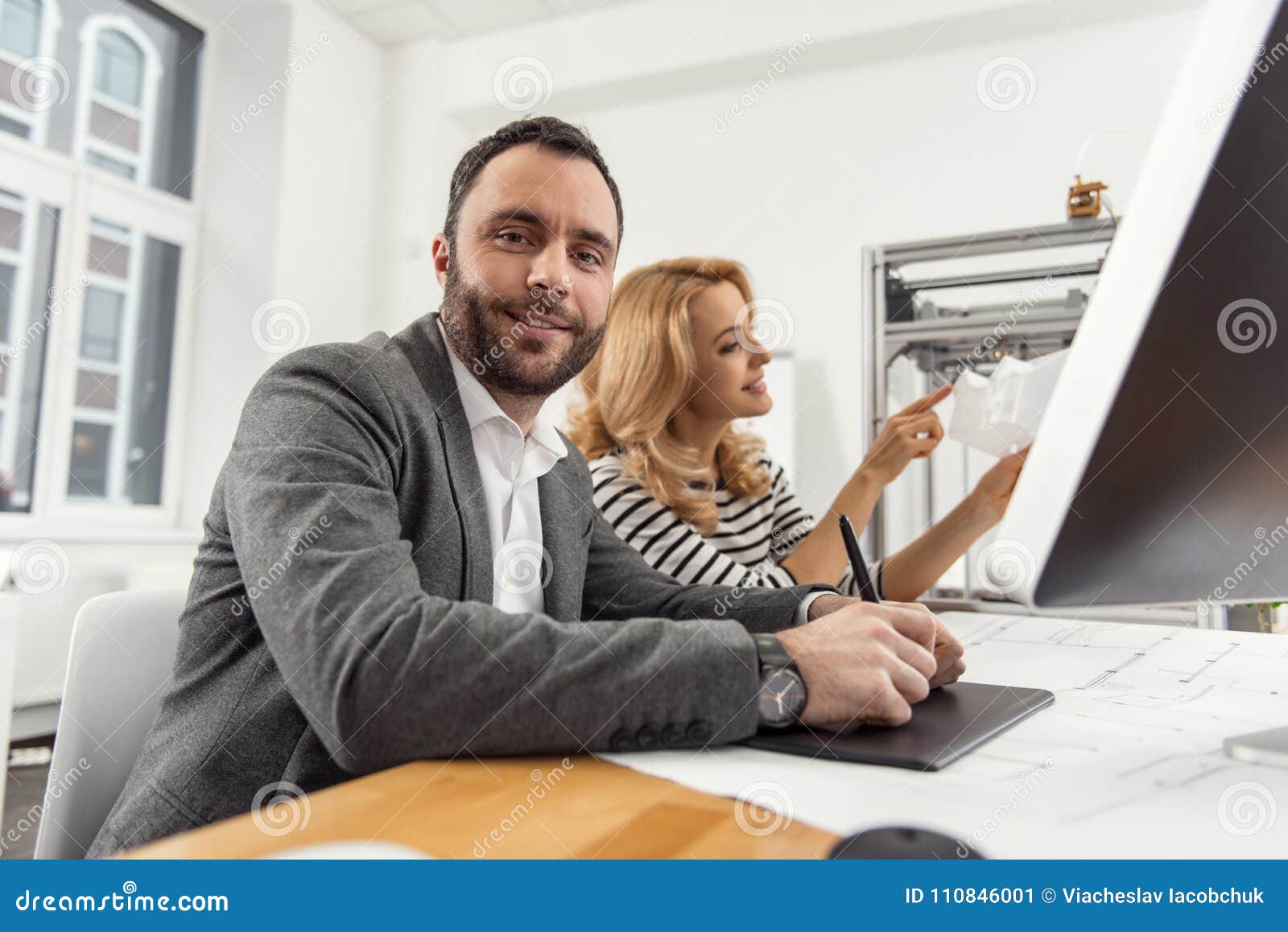 Upbeat Colleagues Collaborating on a New Project Stock Image - Image of ...